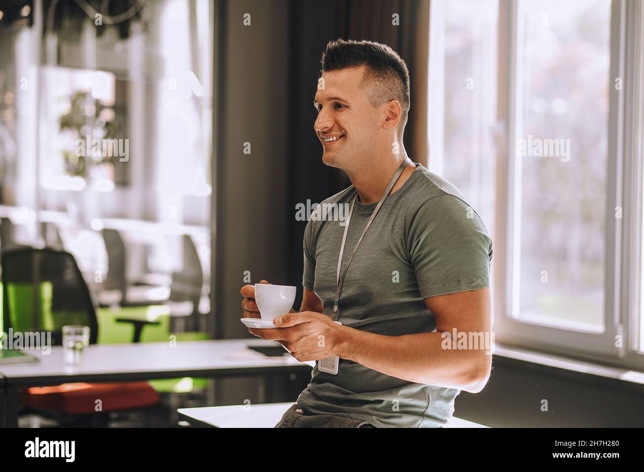 Office worker having coffee while coffee break Stock Photo - Alamy
