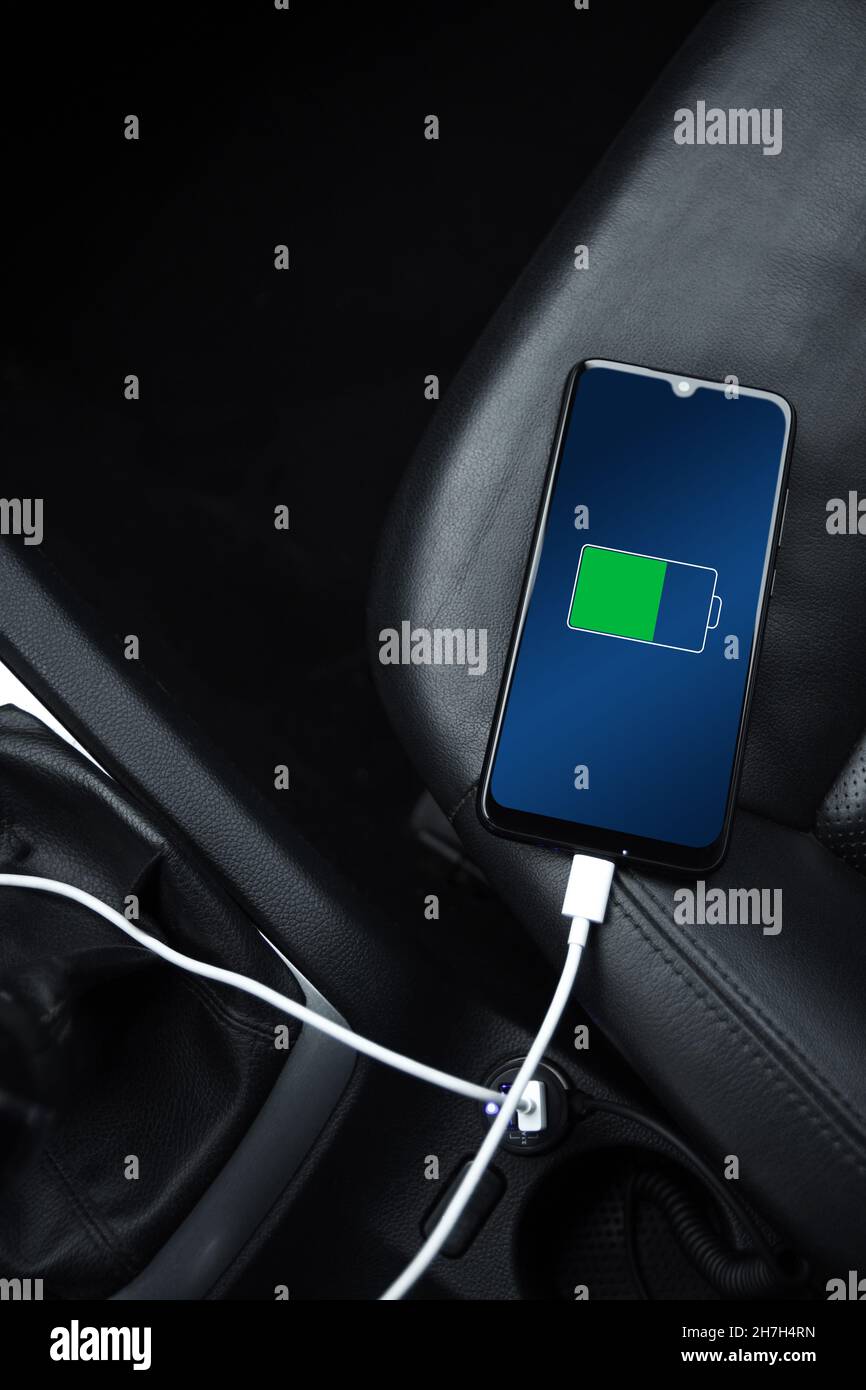 Mobile phone ,smartphone, cellphone is charged ,charge battery with usb ...