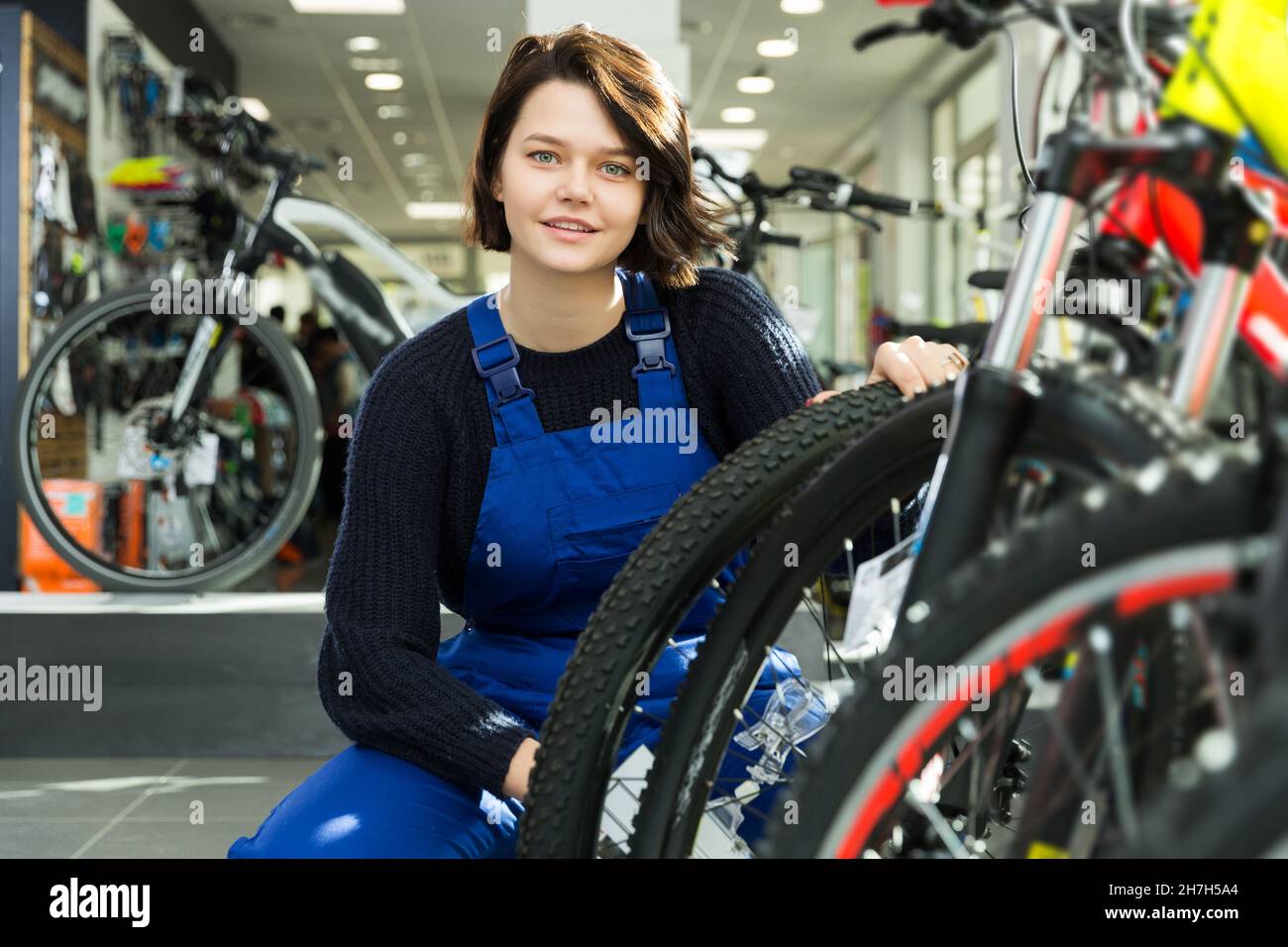 Holding cycle hi-res stock photography and images - Alamy