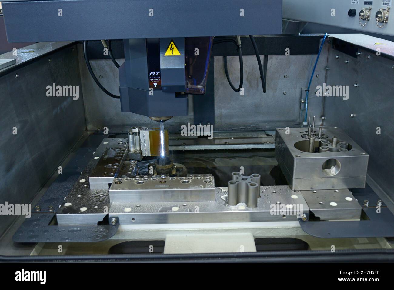Electrical discharge machining. Electrical discharge machine EDM shapes ...