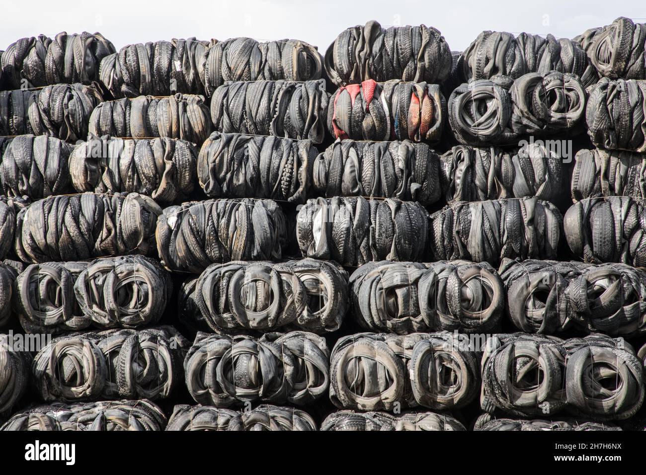 Piles of old tires waiting for recycling Stock Photo - Alamy