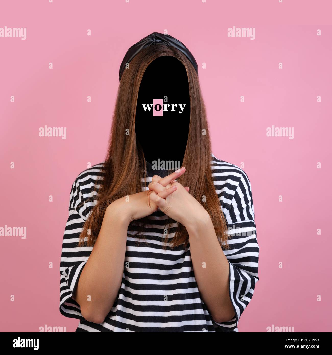 Contemporary creative portrait of faceless girl with word worry instead ...
