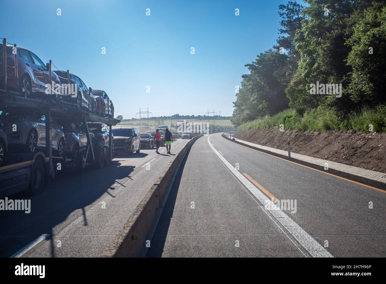 traffic jam on the highway, cars waiting in the convoy due to a traffic ...