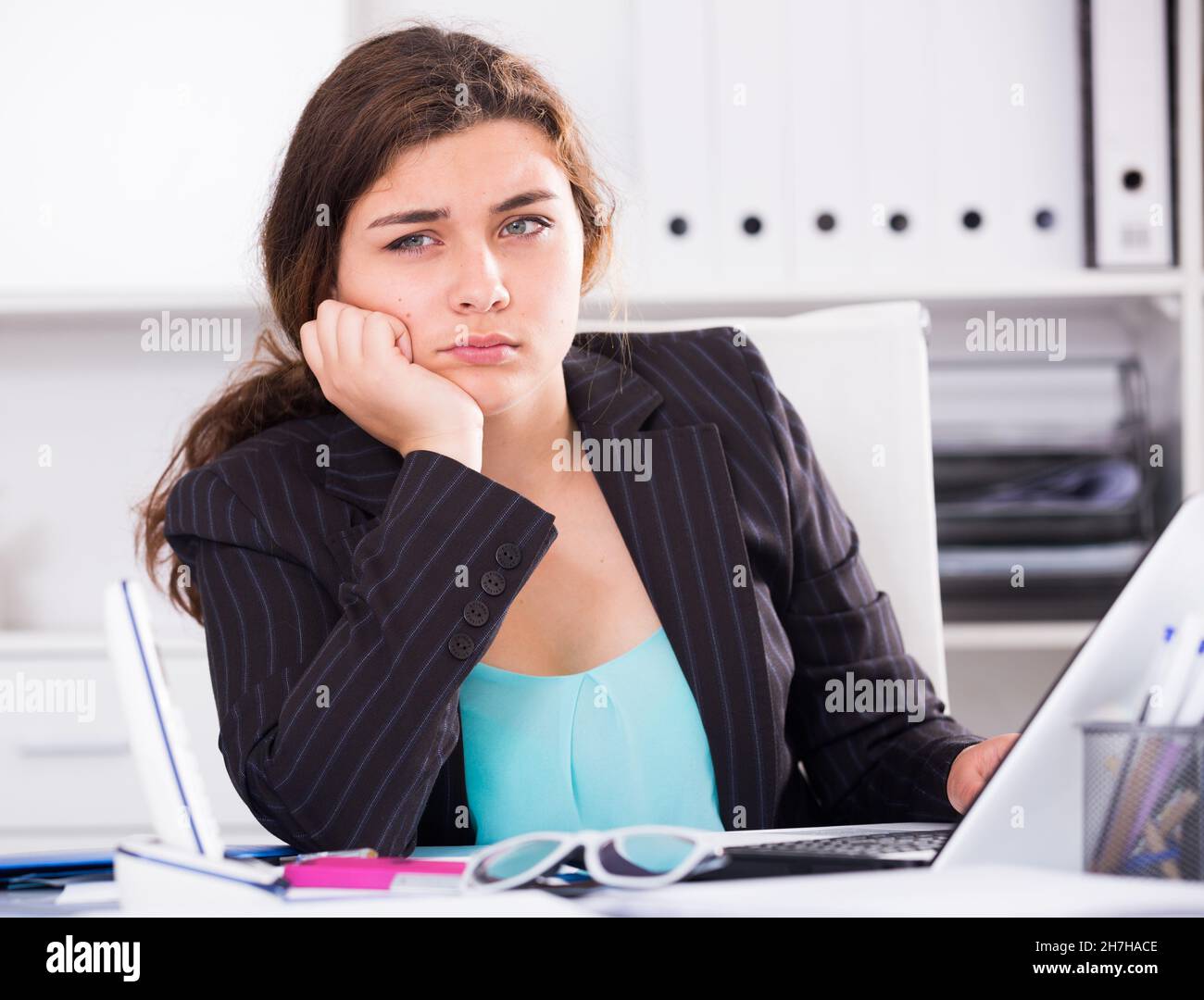 Woman beginner is having complicated issue with project Stock Photo - Alamy