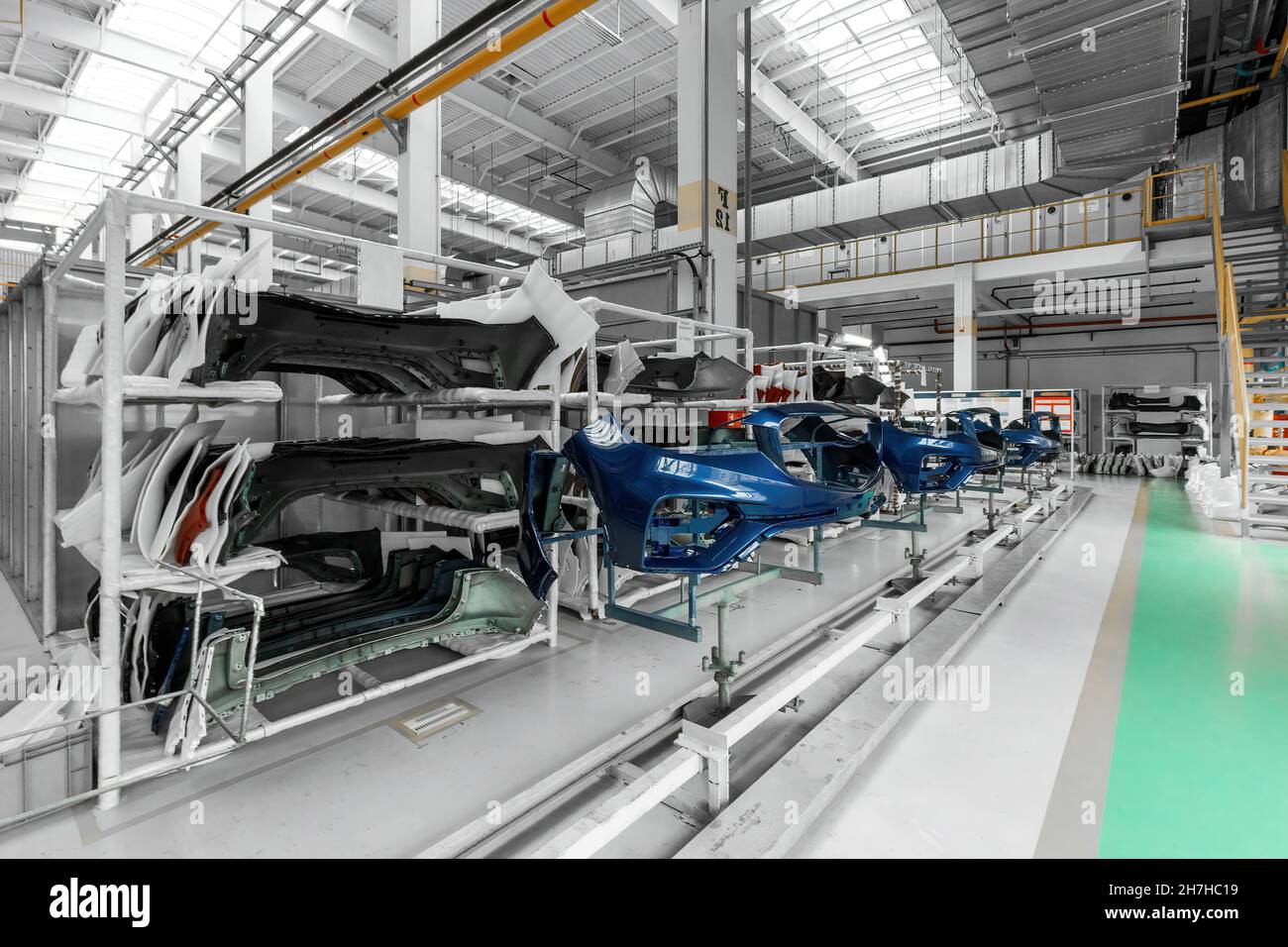 Photo of a warehouse with shelves with spare parts for cars and ...