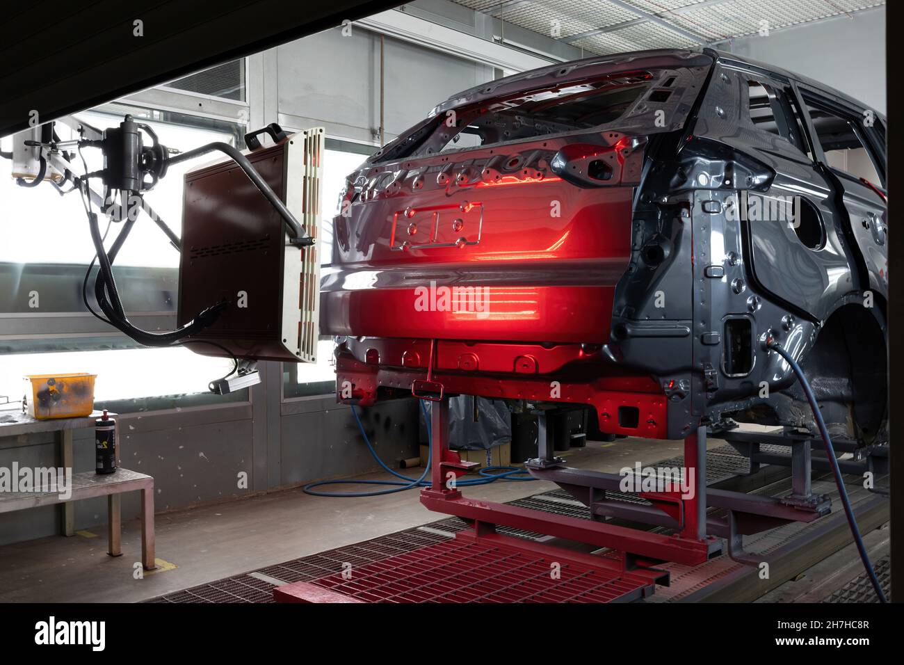 Automobile production line. ar painting. Modern car assembly plant. Red ...