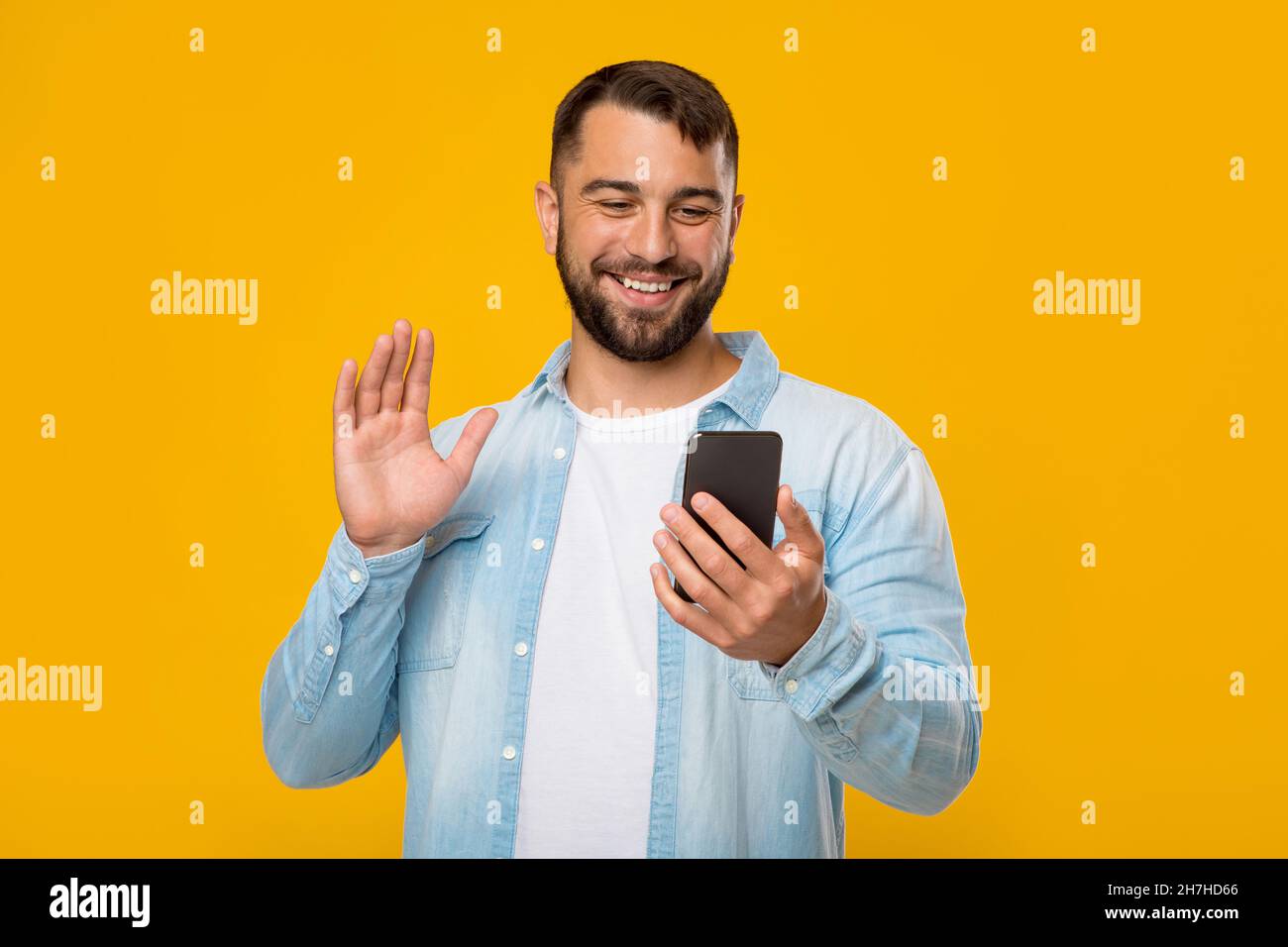 Happy man making phone call hi-res stock photography and images - Alamy