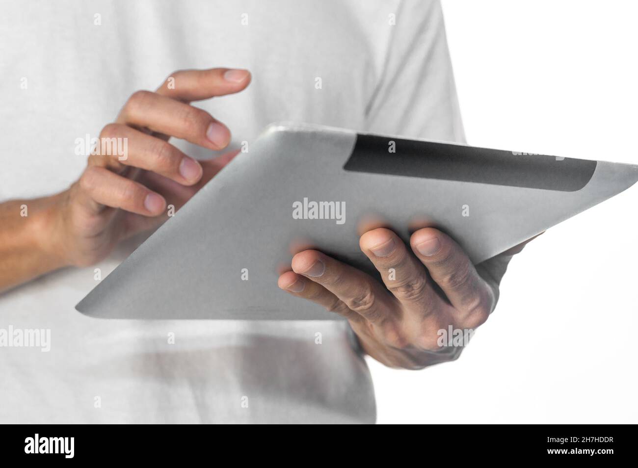 Hand using tablet touching on screen technology Stock Photo - Alamy