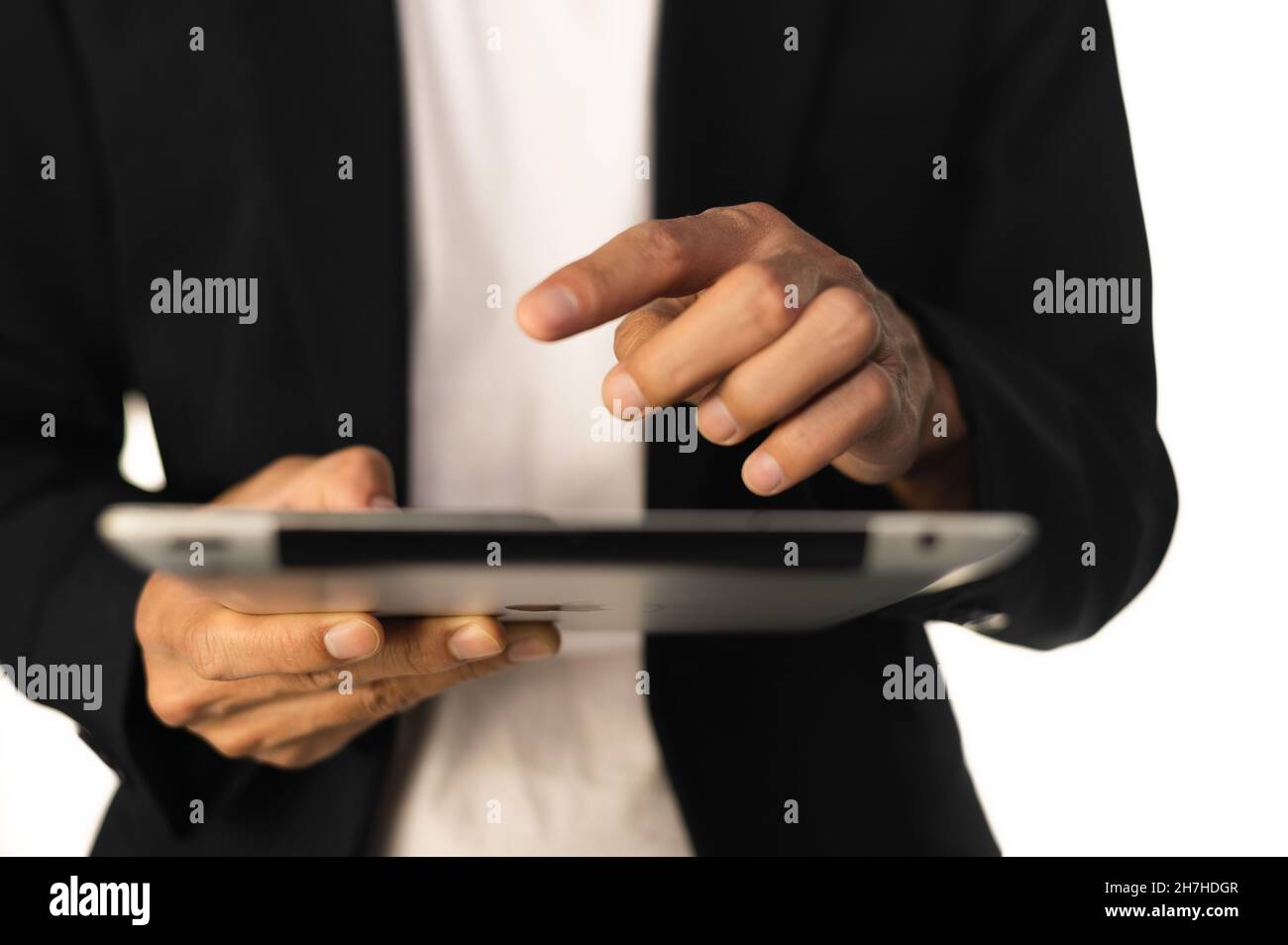 Hand using tablet touching on screen technology Stock Photo - Alamy