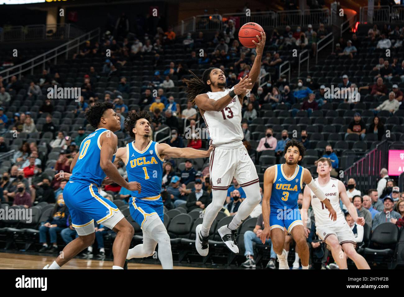 Bellarmine Knights guard Dylan Penn (13) scores on a layup during a ...