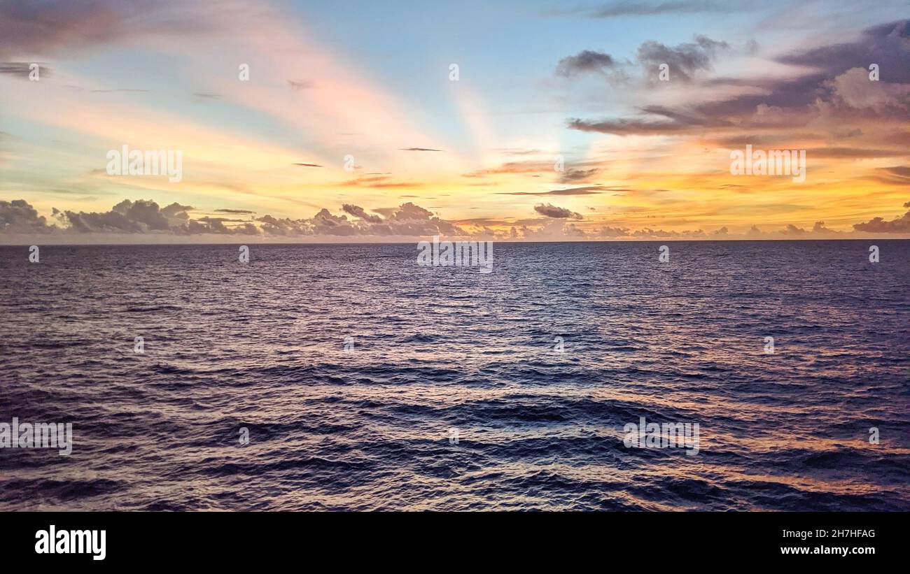 Landscape of the sea under the sunlight during a beautiful sunset in ...