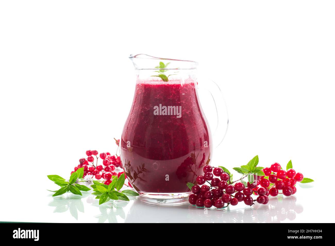 freshly squeezed thick natural juice with pulp from ripe red viburnum ...