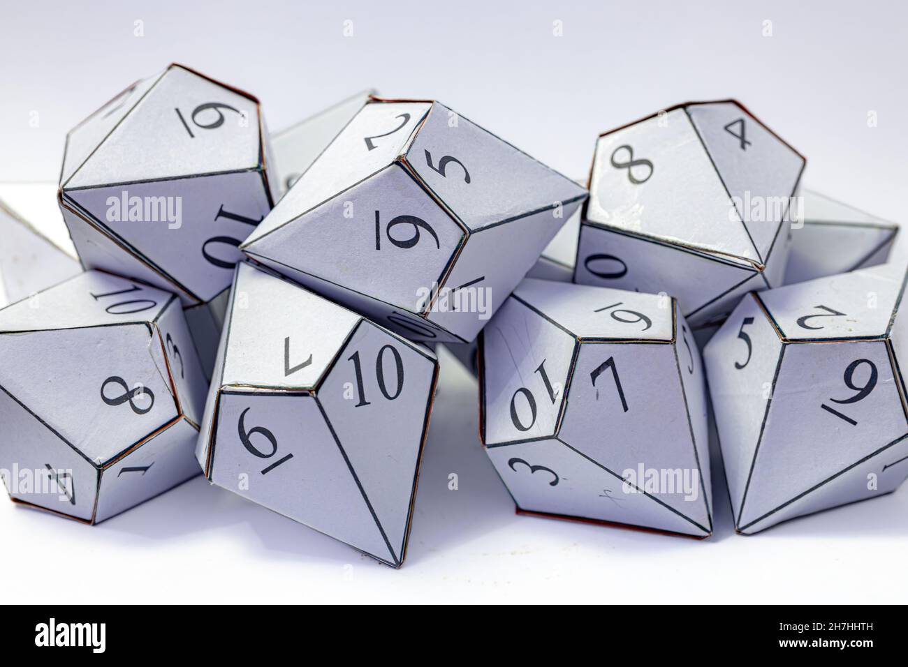 handmade Pentagonal trapezohedron dice in white paper with numbers ...