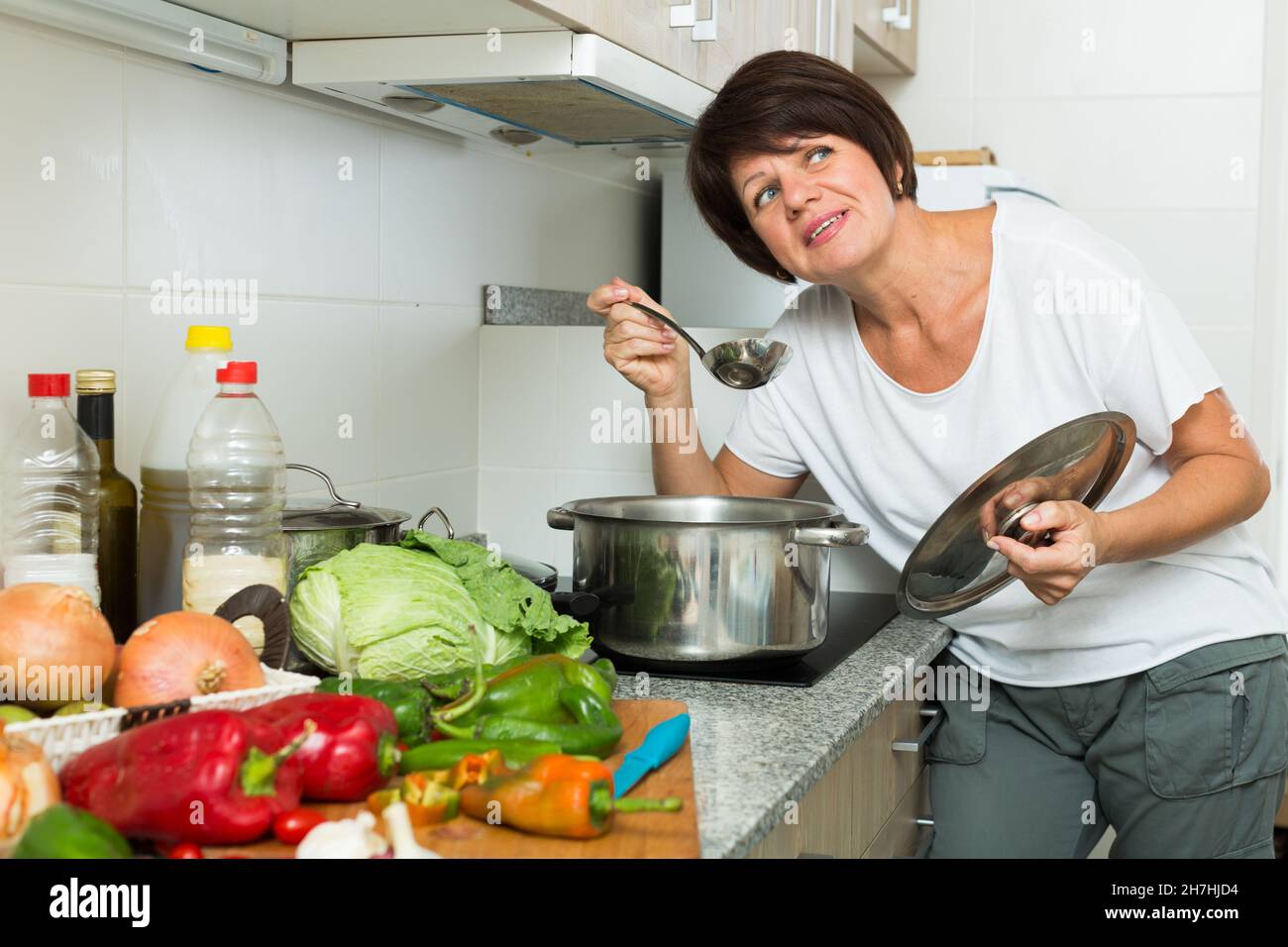 Mixing and tasting soup hi-res stock photography and images - Alamy