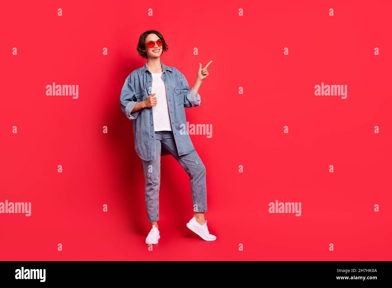 Full length body size photo girl wearing sunglass pointing copyspace ...