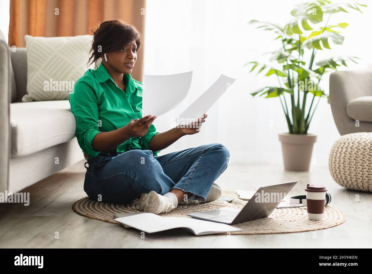 Worried Black Lady Reading Bills Having Problems With Papers Indoor ...