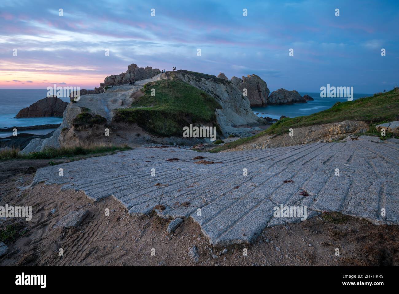 Concrete driveway leading to the ocean beach Stock Photo - Alamy