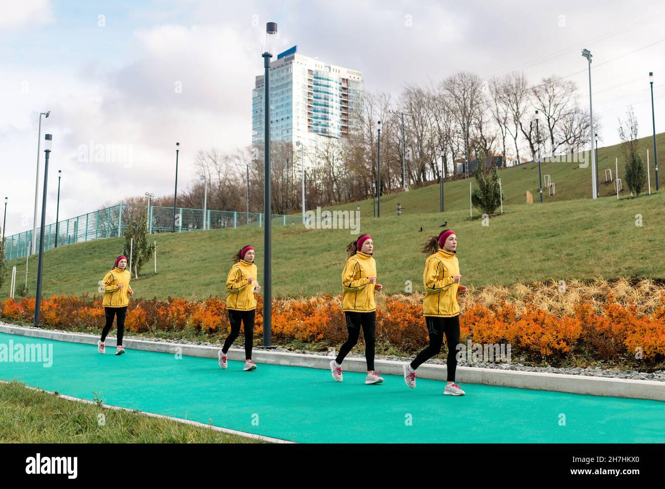 panorama with several images of the same female jogger on a running ...