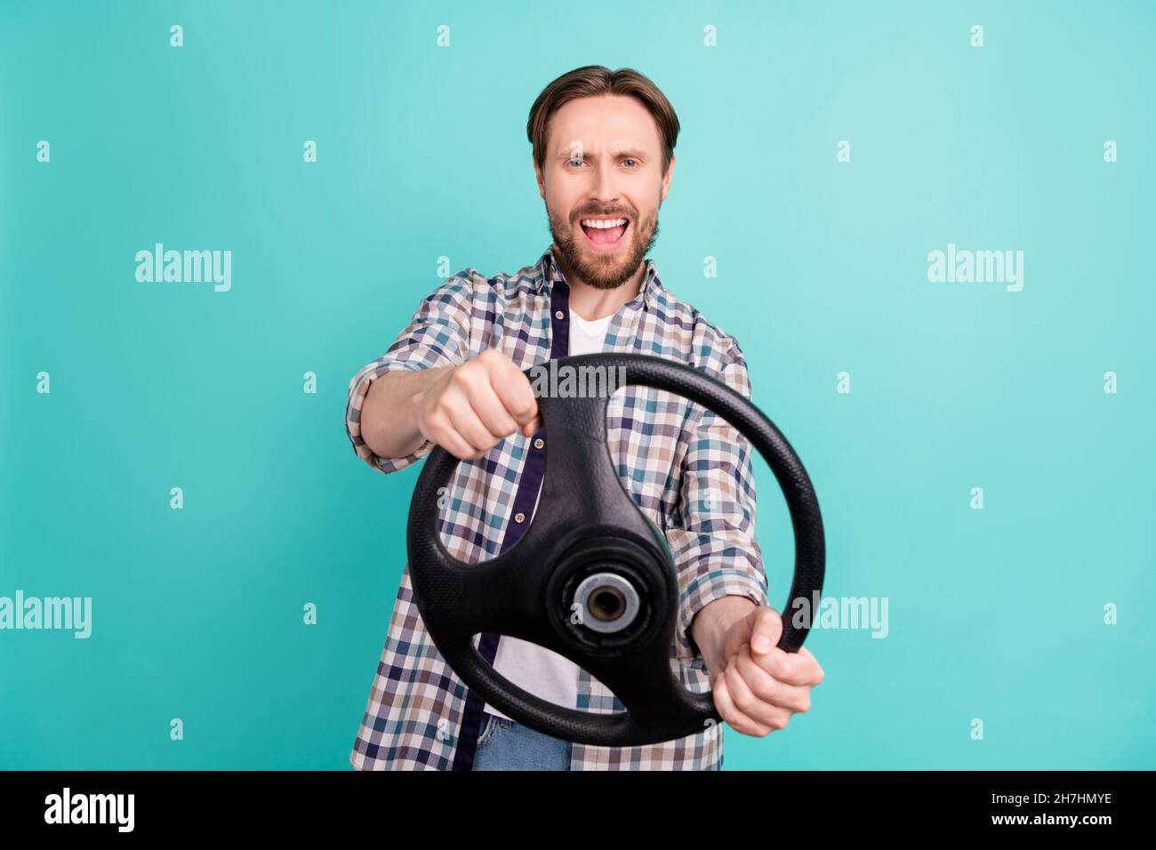 Photo of young man happy positive smile excited enjoy ride car fast ...