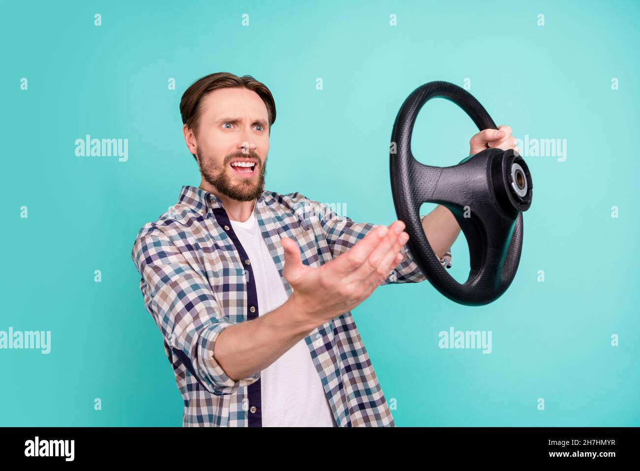 Profile side photo of young man hold steering-wheel angry blame driver ...