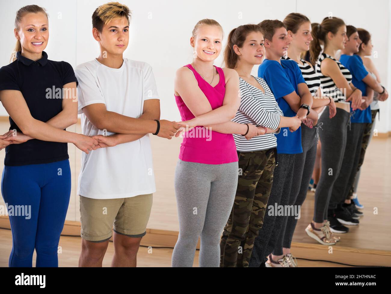 Children dancing folk dance in studio smiling Stock Photo - Alamy