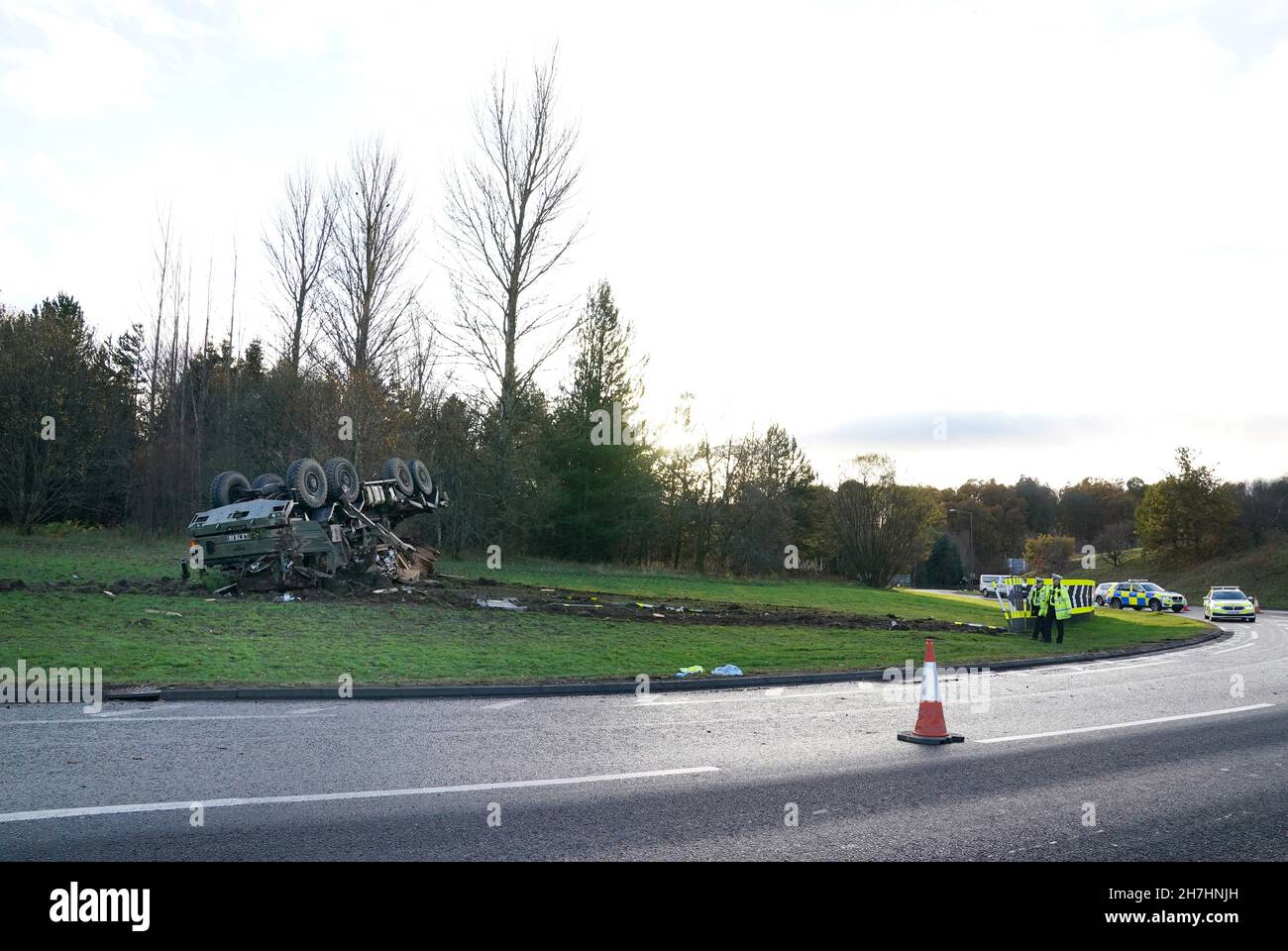 An overturned army vehicle sits in the middle of the Keir roundabout on ...