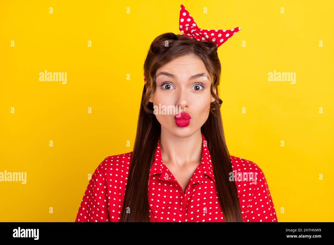 Photo of pretty adorable young woman dressed red clothes sending you ...
