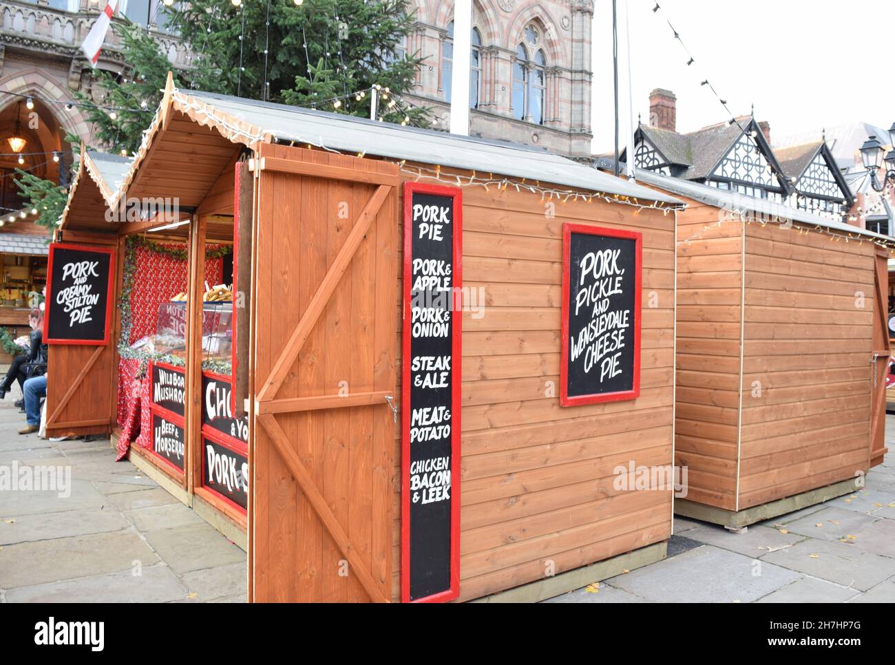 Chester UK Christmas market meat stall Stock Photo - Alamy