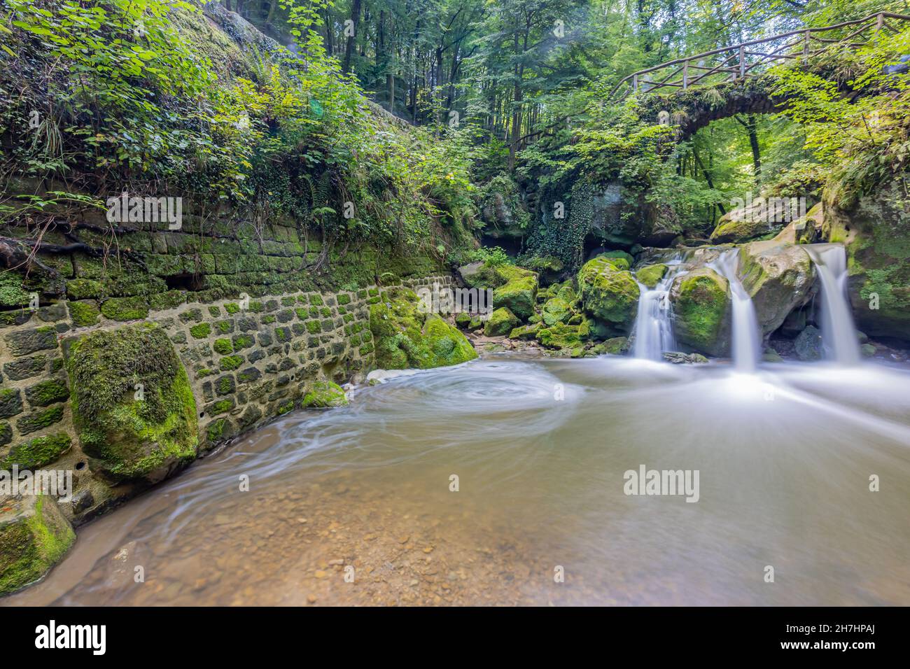 Schiessentümpel waterfall, stone bridge over the Black Ernz river ...
