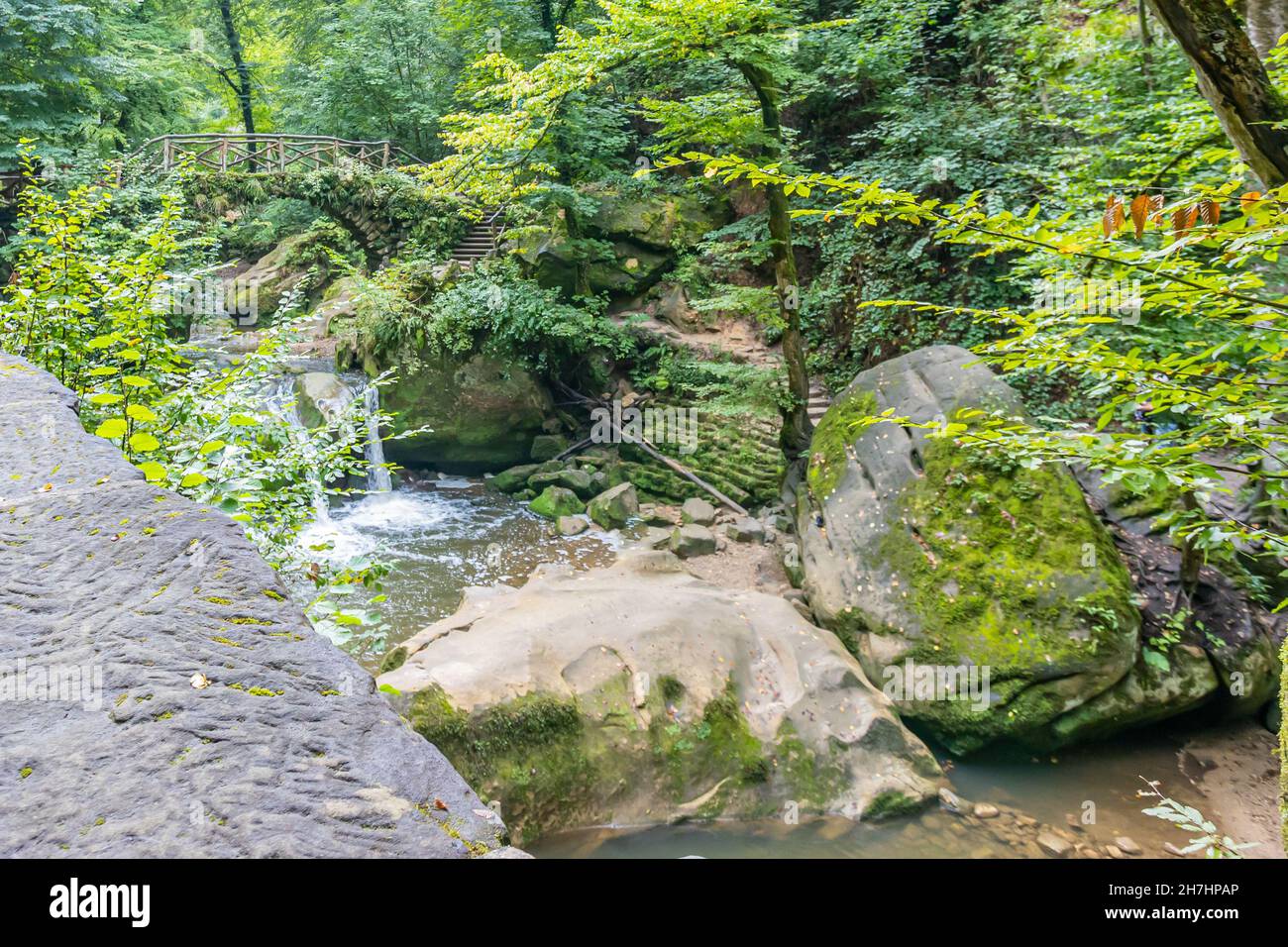 Mullerthal Trail, stone bridge over the Ernz Black river ...