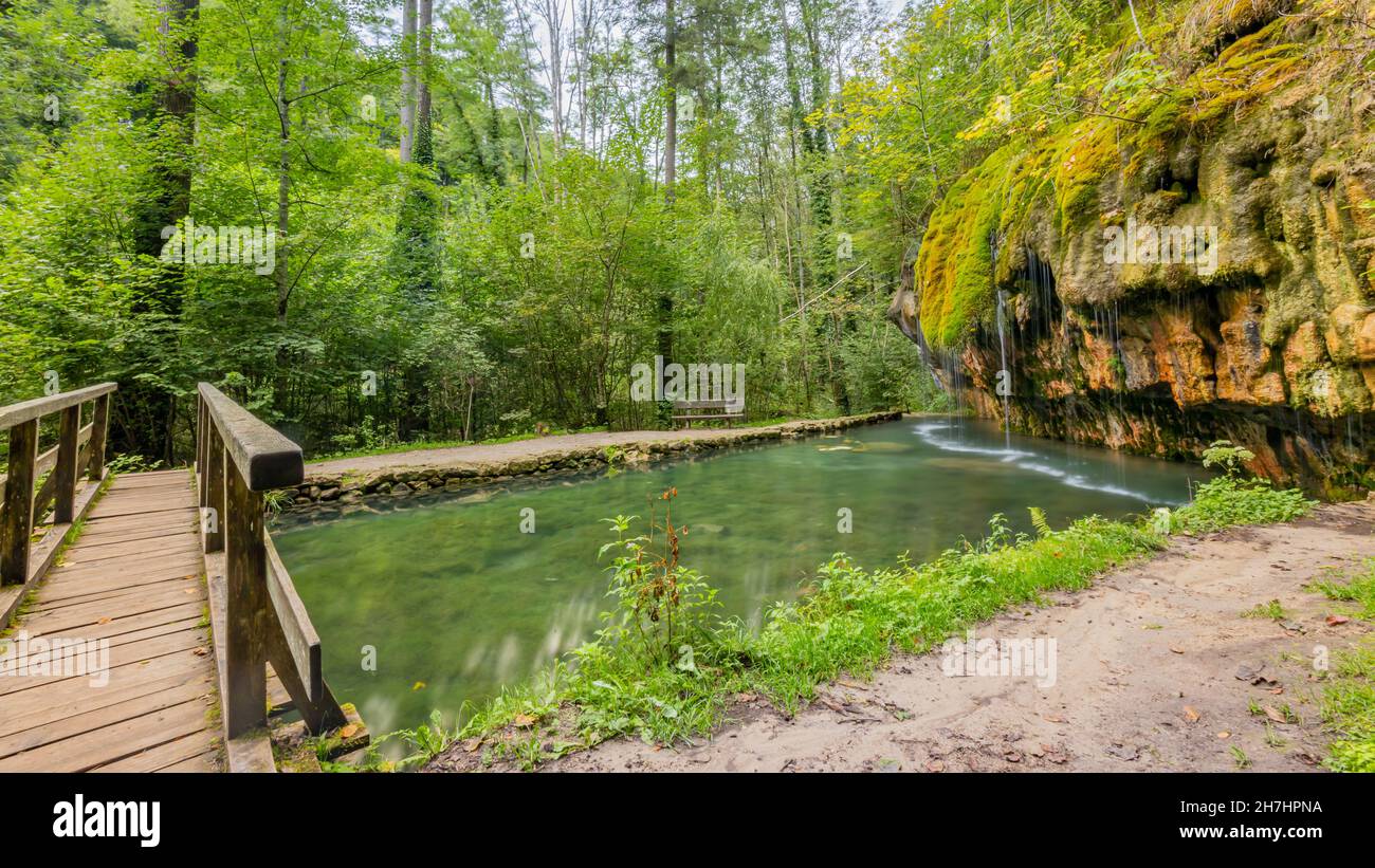 Kallektuffquell waterfall, Mullerthal Trail, wooden bridge, crystal ...