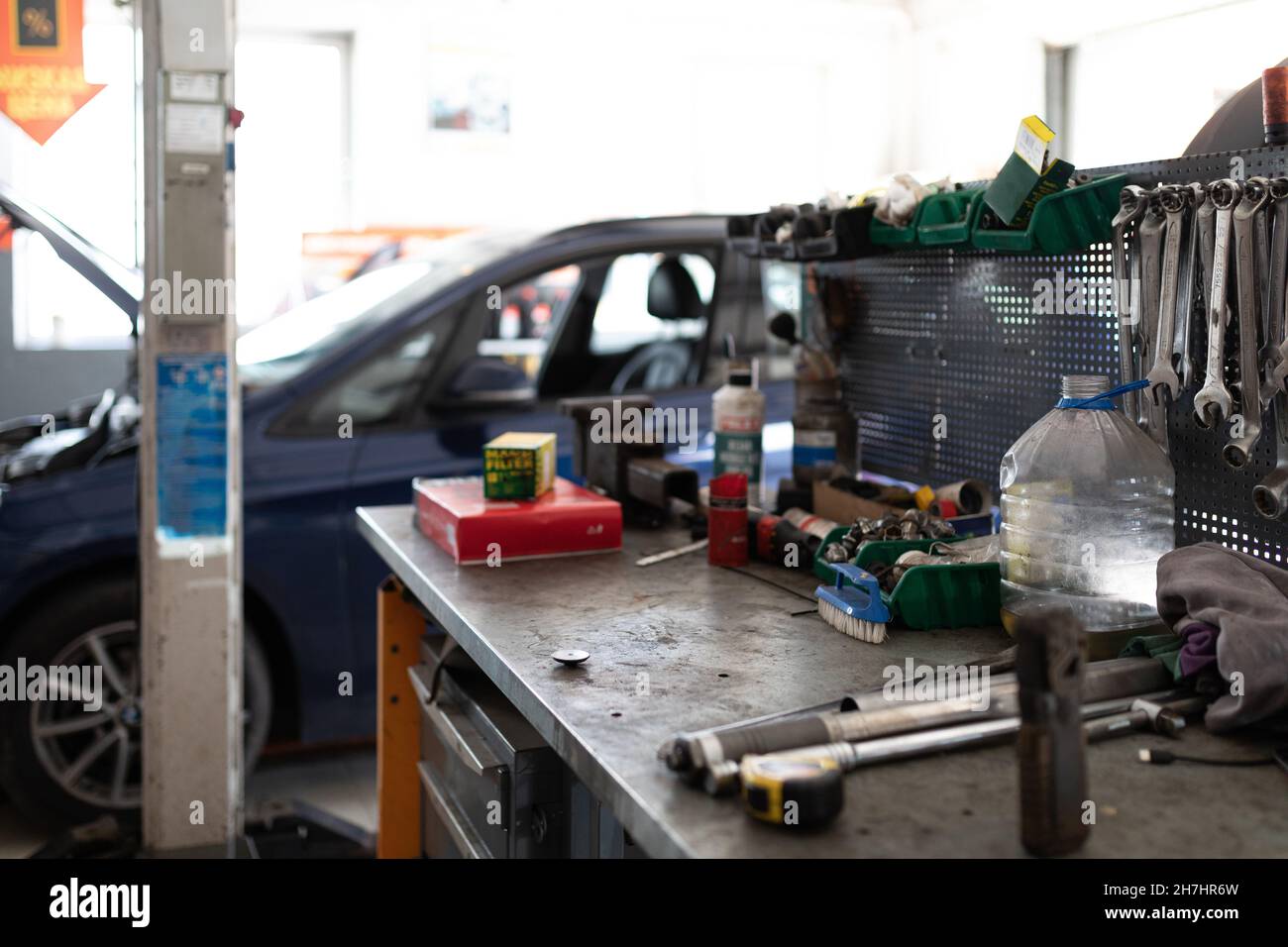 Photo of a metal table with working tools for working and repairing an ...