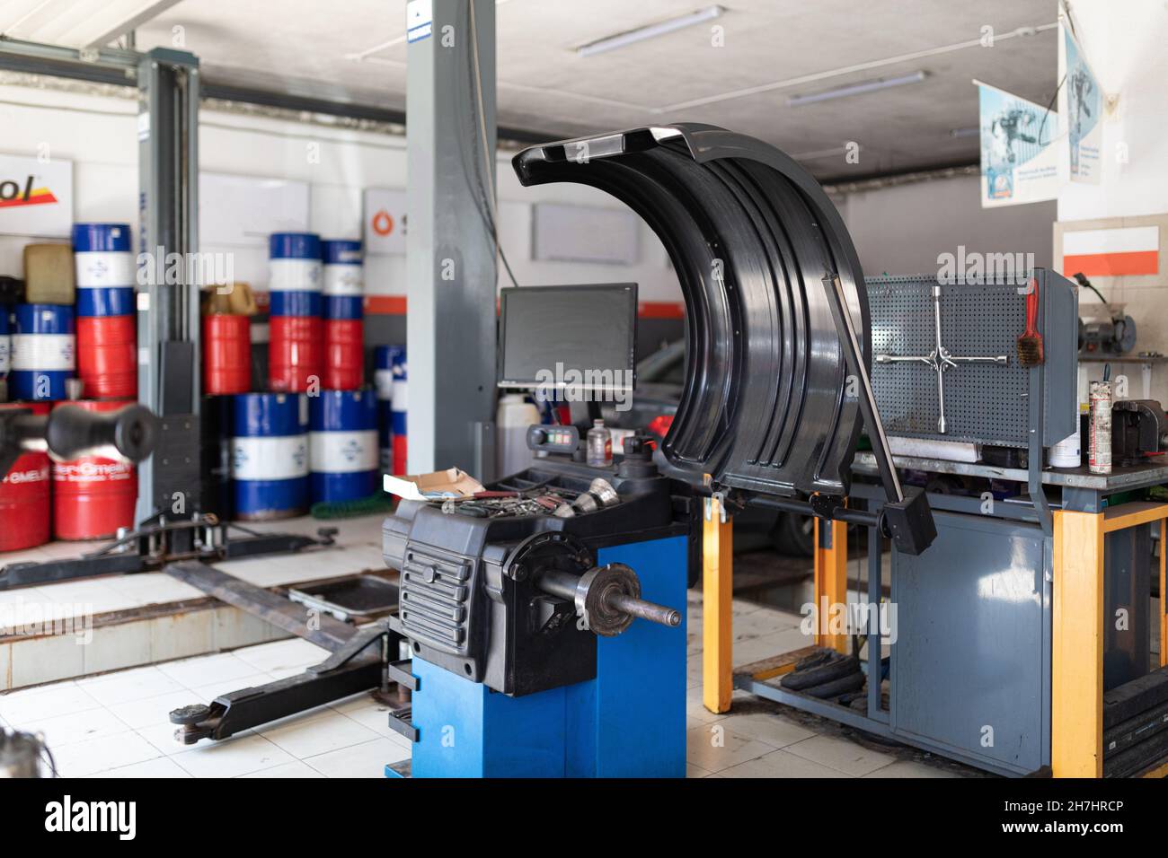 Photo of a machine for balancing wheels and repairing tires of an auto ...