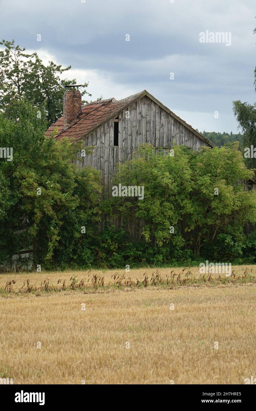Fields and wooden barn in the Franconian summer landscape around Aufseß ...
