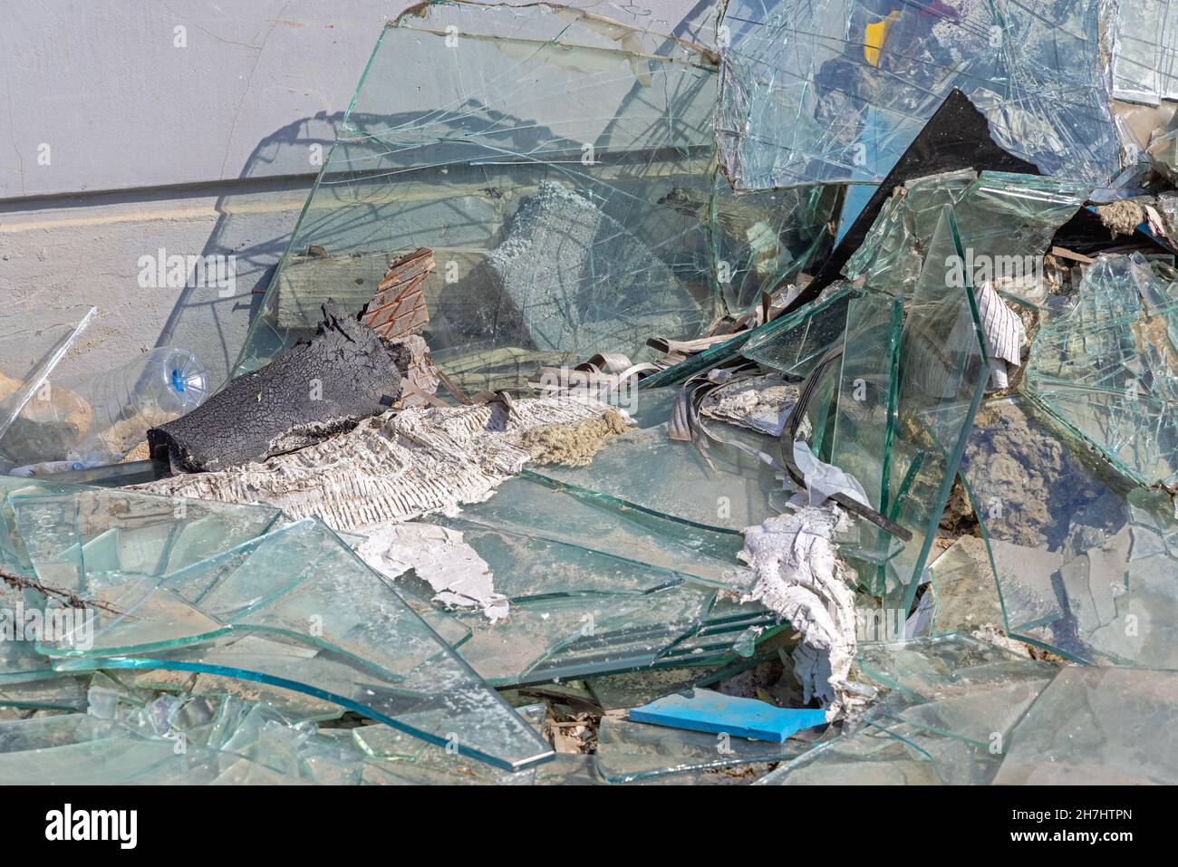 Big Bunch of Broken Glass Windows Debris Damage Stock Photo - Alamy