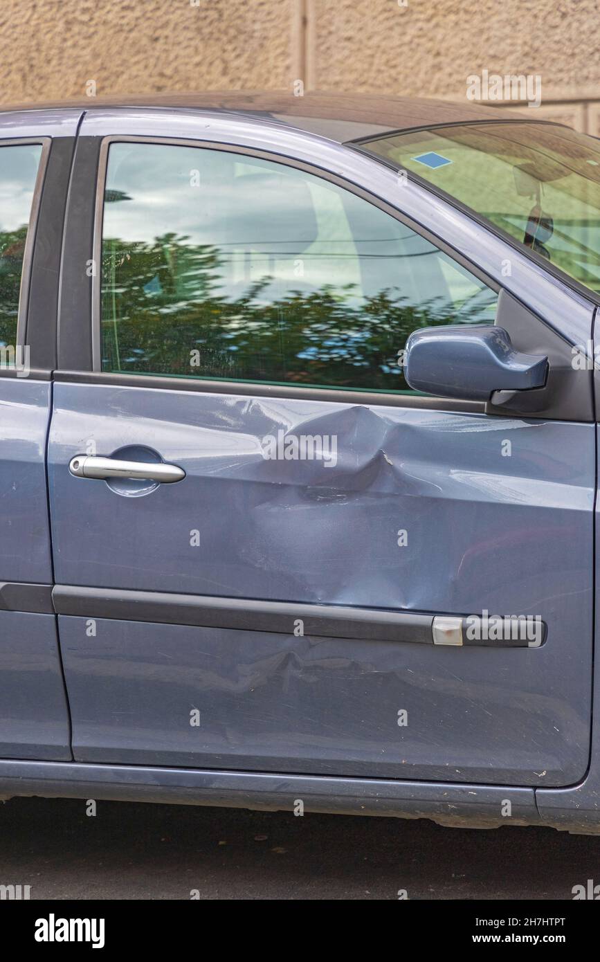 Bent Car Front Door Metal Damage Accident Stock Photo - Alamy