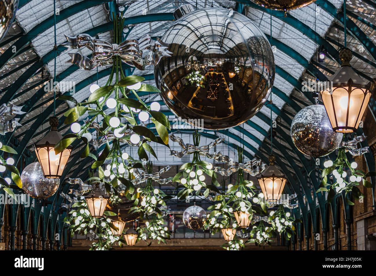 Giant baubles and mistletoe in Covent Garden, London during the festive ...