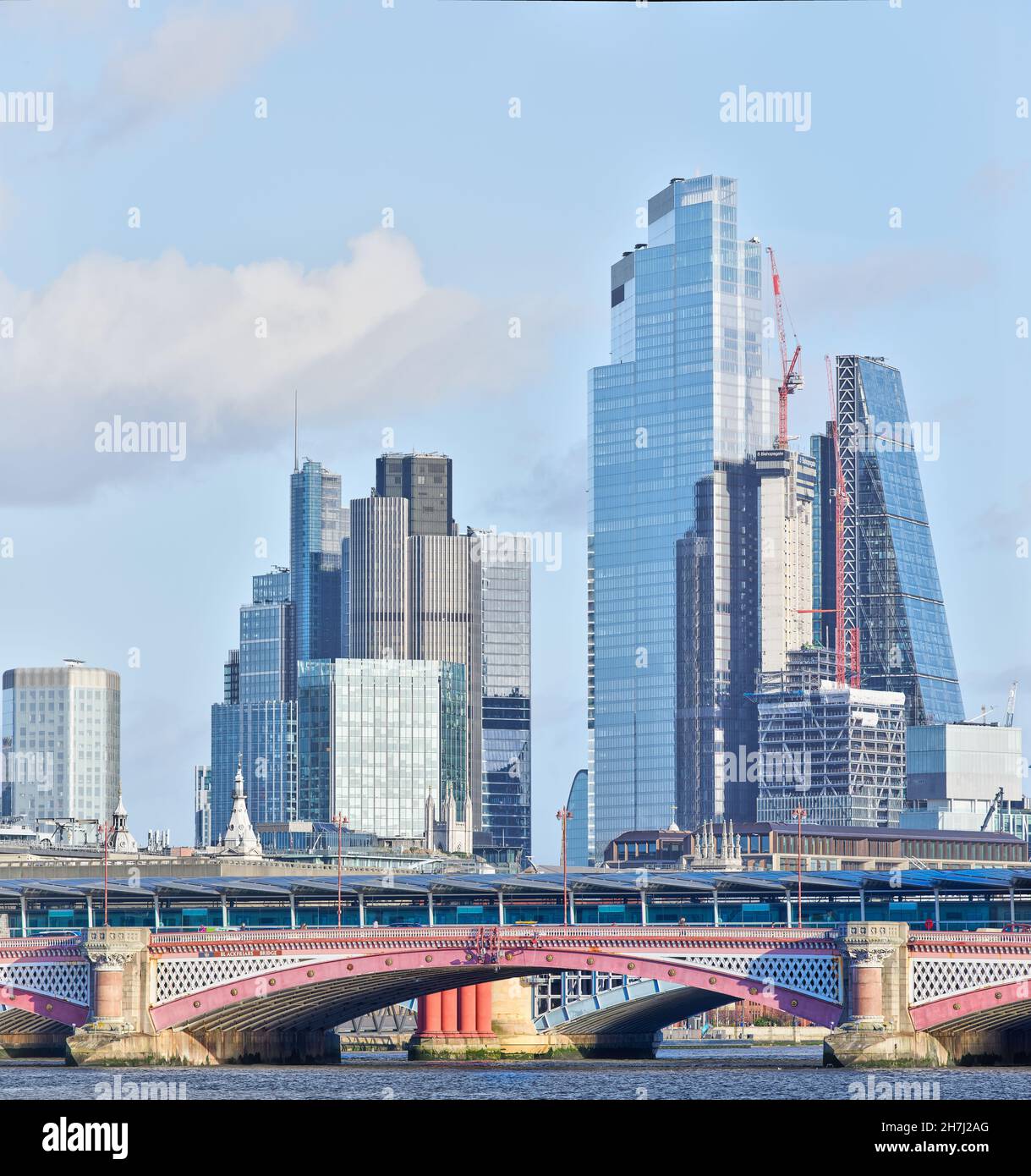 Blackfriars bridge over the river Thames, with the city of London ...