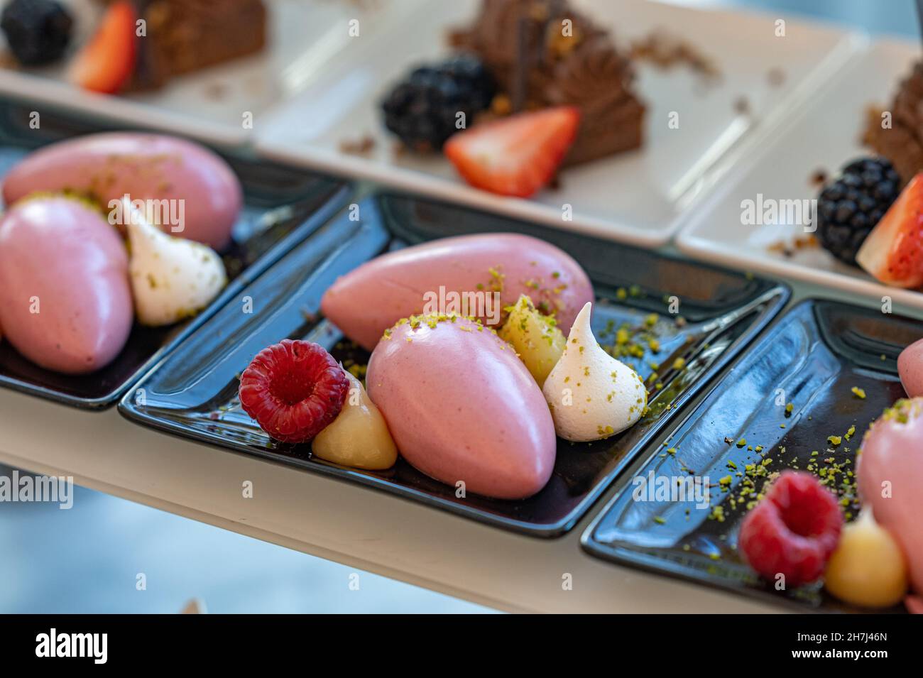 Closeup of rows of sweet and tasty pastries Stock Photo - Alamy