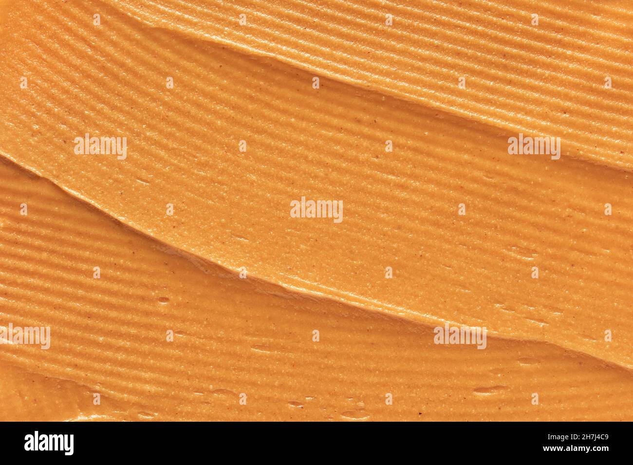 Peanut butter texture. Spread swirl. Organic keto food Stock Photo - Alamy