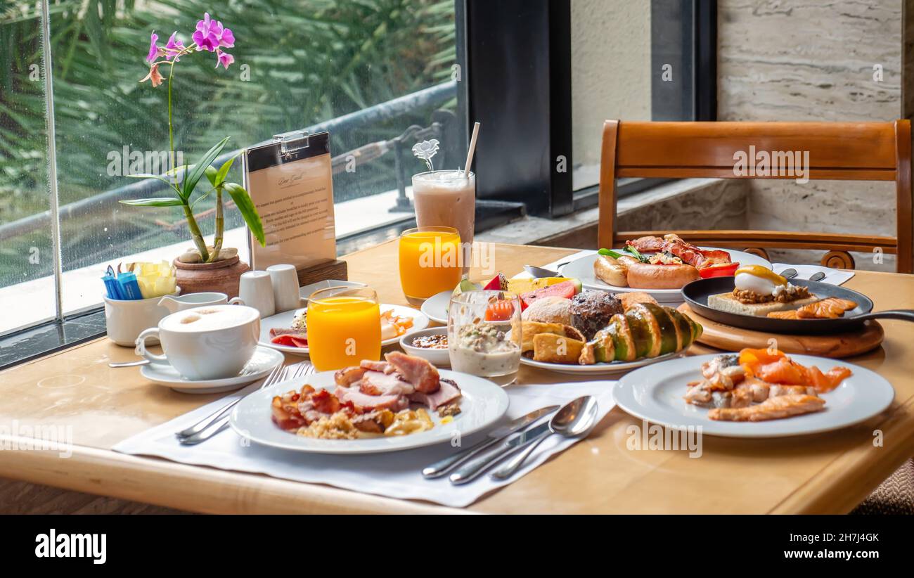 Breakfast in luxury hotel. Table full various food from buffet in modern resort Stock Photo Alamy