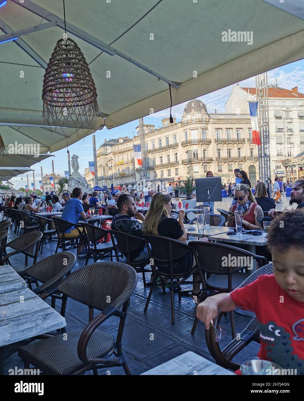 MONTPELLIER, FRANCE - Jan 06, 2021: A vertical shot of people at an ...
