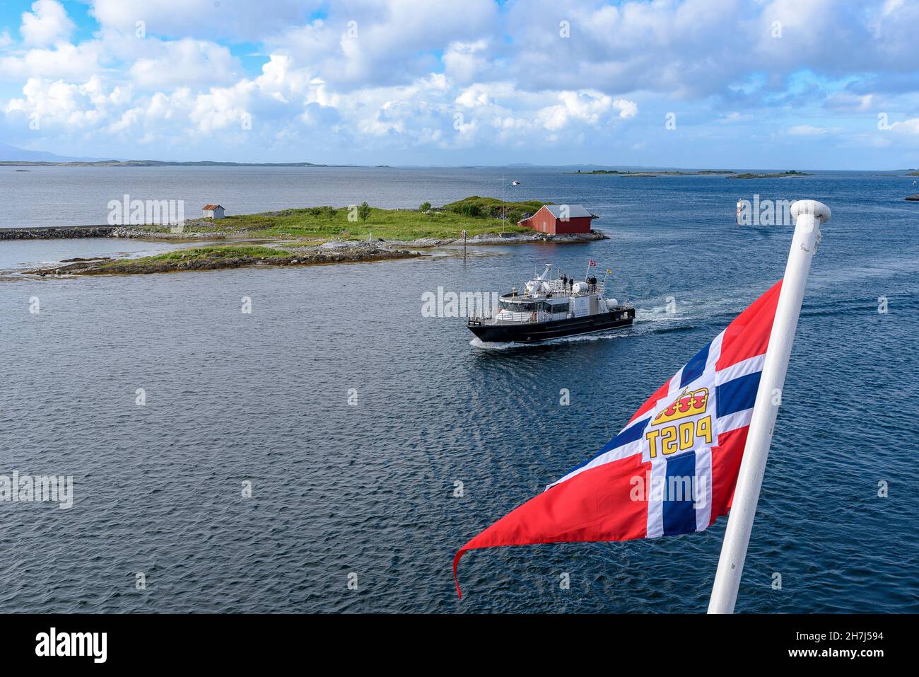 View from the Hurtigruten ship Richard With with the Norwegian flag ...