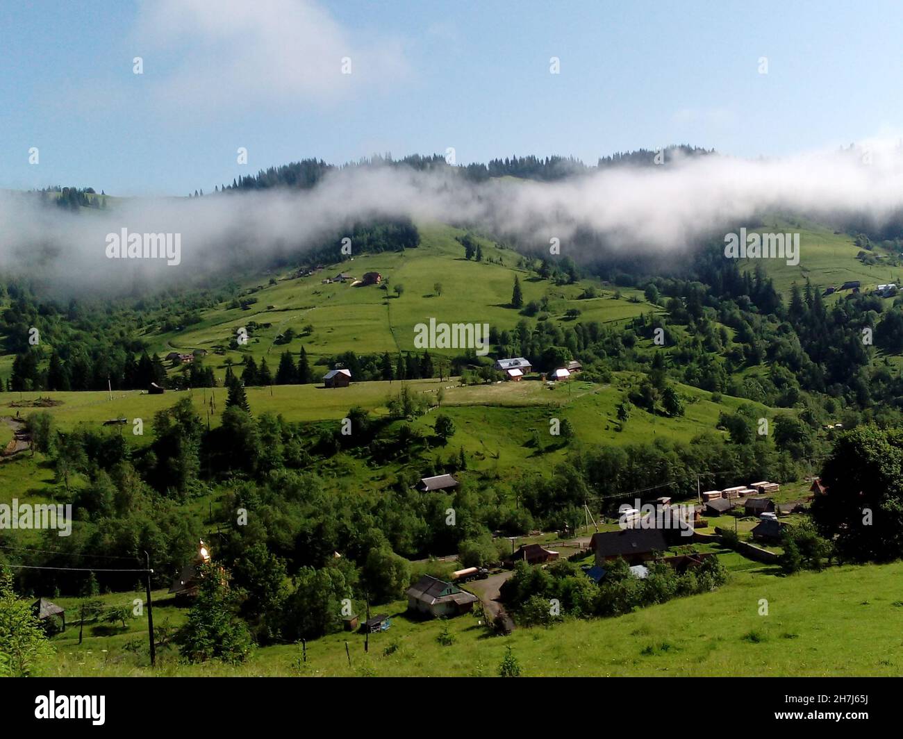 Beautiful summer view with woods and clouds, as seen from the top of ...