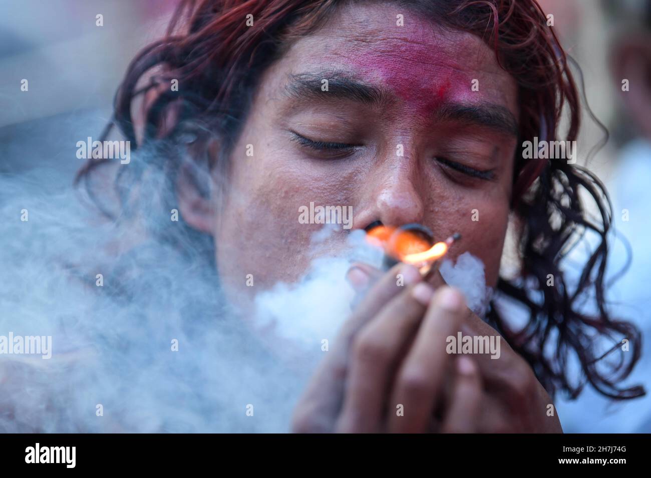 The Sadhus (Holy Men) smoke ganja (Cannabis) at a temple during Brahma ...
