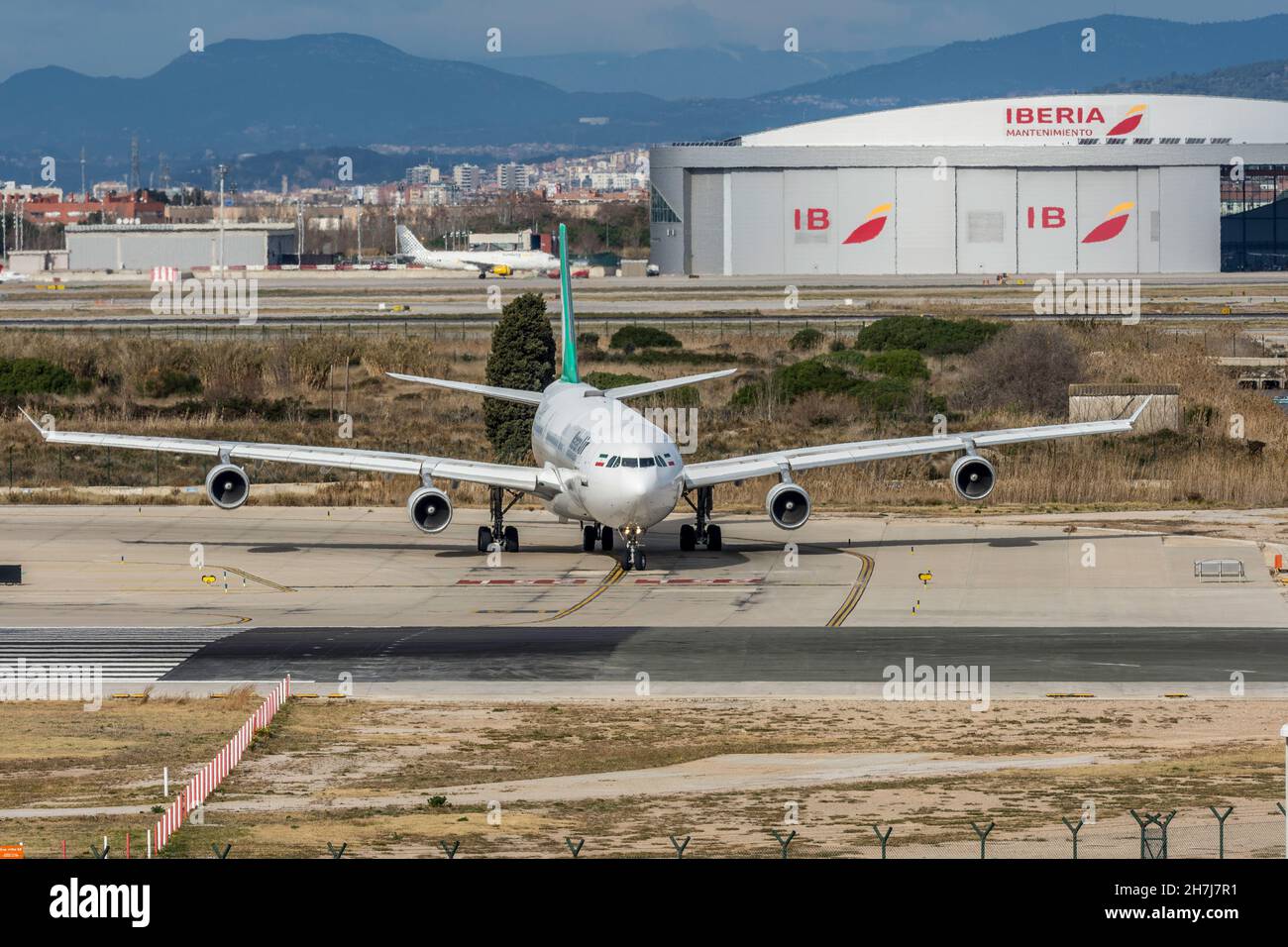 BARCELONA, SPAIN - Oct 25, 2021: Big passenger airline plane in the sky ...