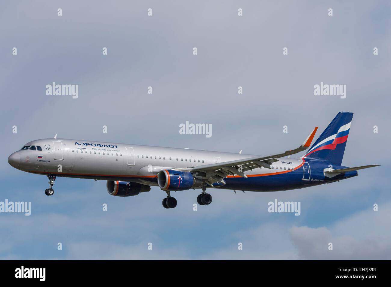 BARCELONA, SPAIN - Oct 25, 2021: Big passenger airline plane in the sky ...