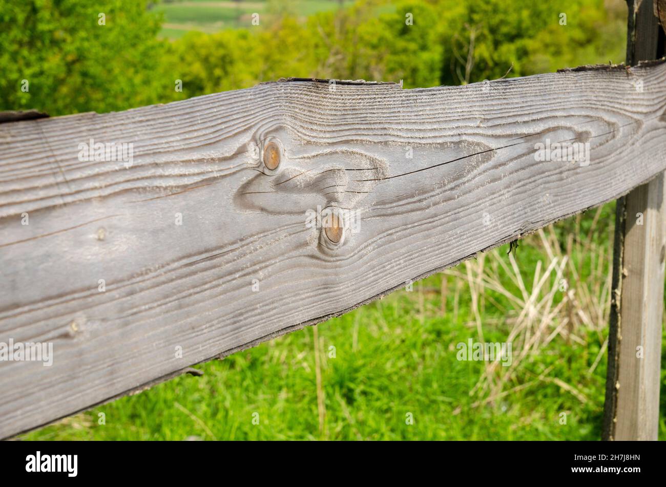 Wooden fence in the village. Private property borderline Stock Photo ...