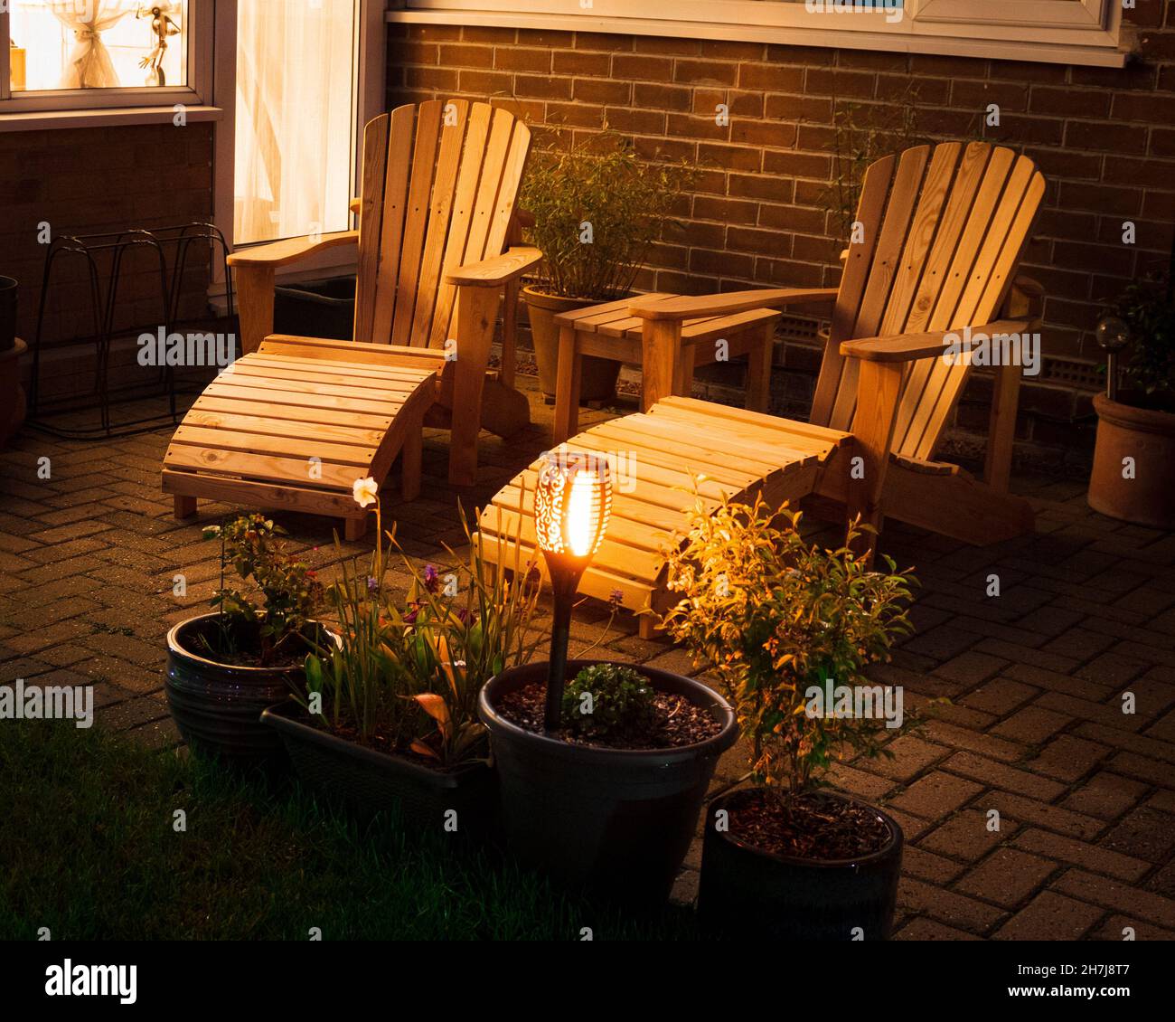 Outdoor furniture in the cozy yard at ni Stock Photo - Alamy