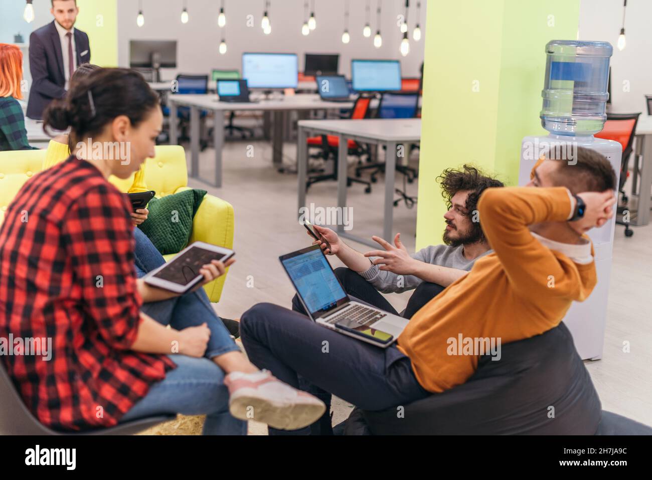 Multiethnic group of employees working in a google environment company ...